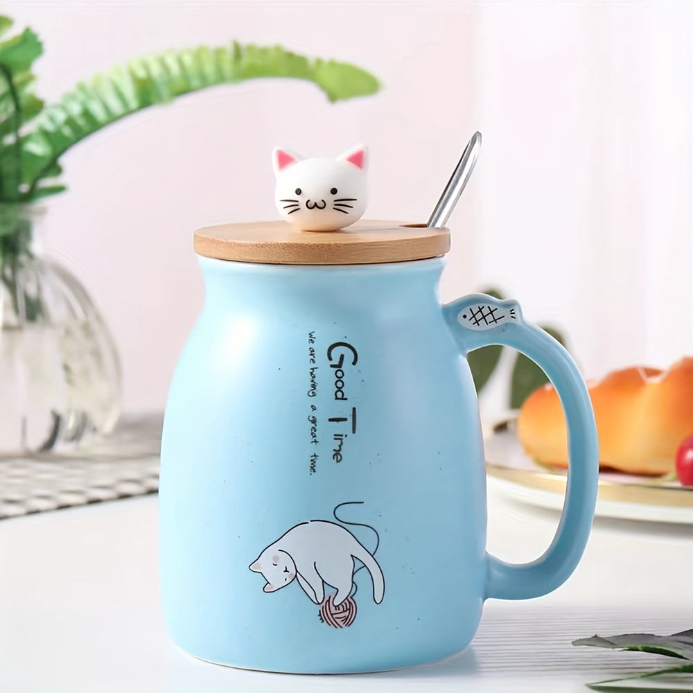 A Ceramic Mug with a Lid And Spoon, Featuring a Cute Cat Design ...