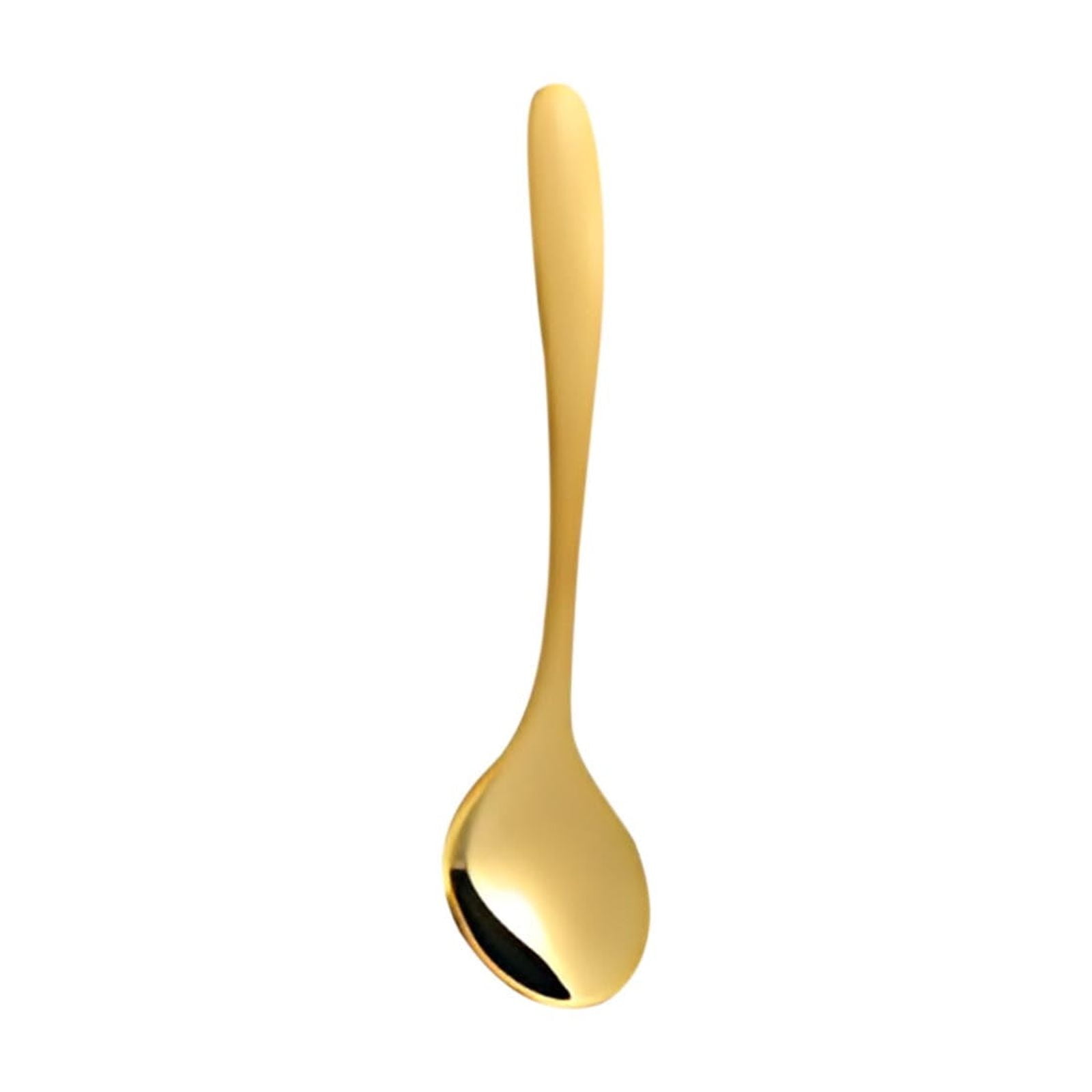 A Polished Stainless Steel Spoon With Curved Ergonomic Handle Designed ...