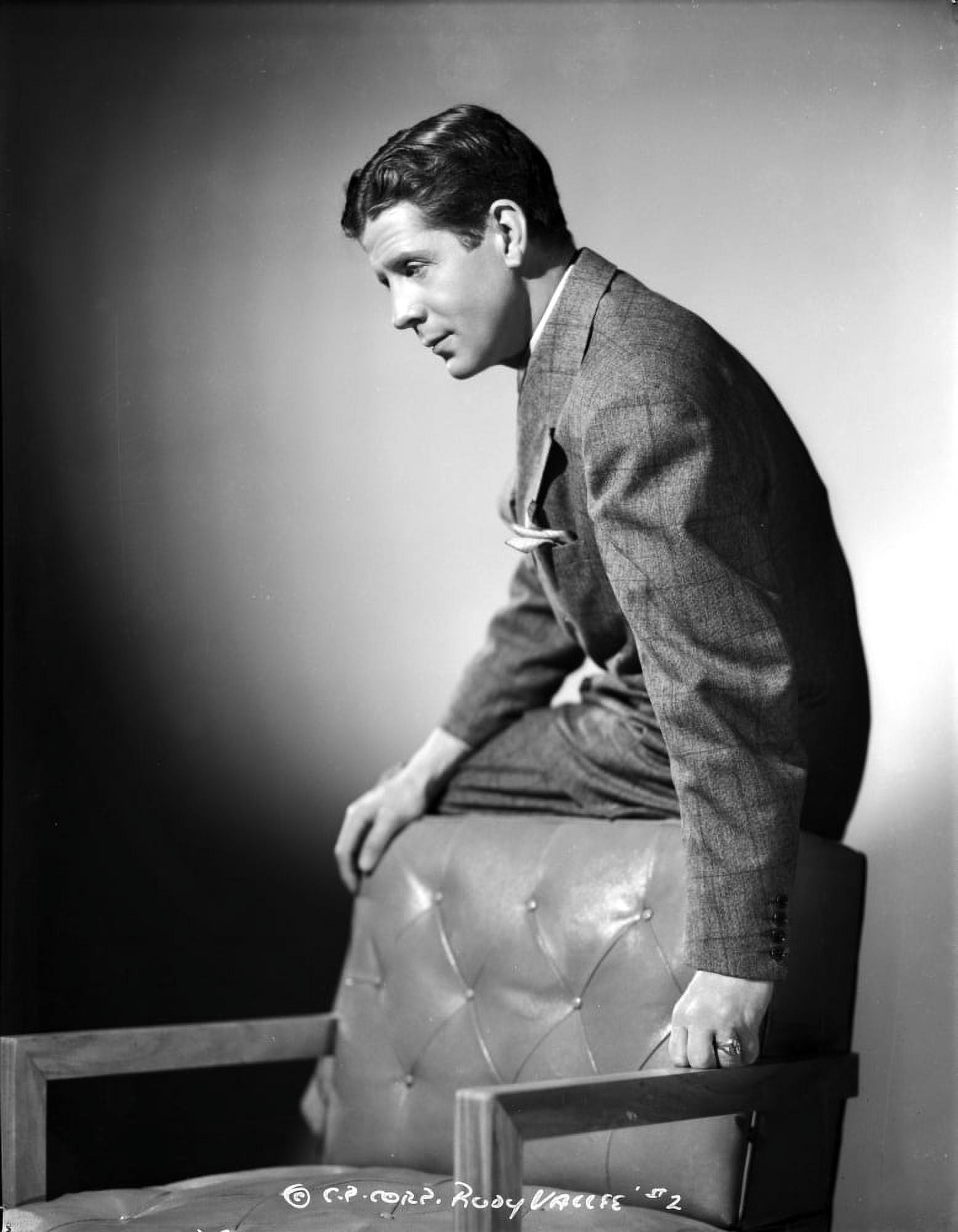 A Portrait Of Rudy Vallee Leaning on A Chair Photo Print (8 x 10 ...