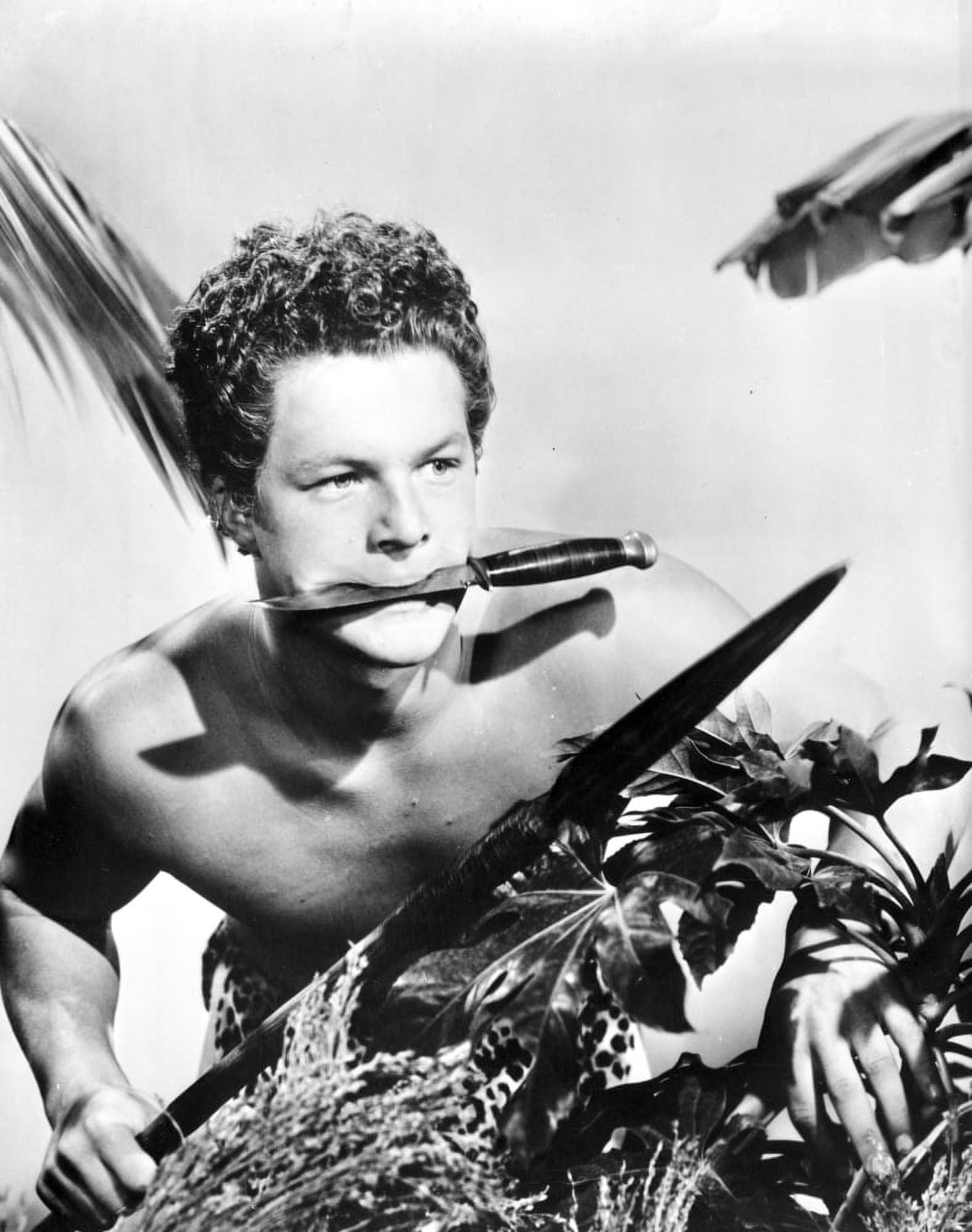 A Promotional Still Of Johnny Sheffield Carrying A Spear Photo Print ...