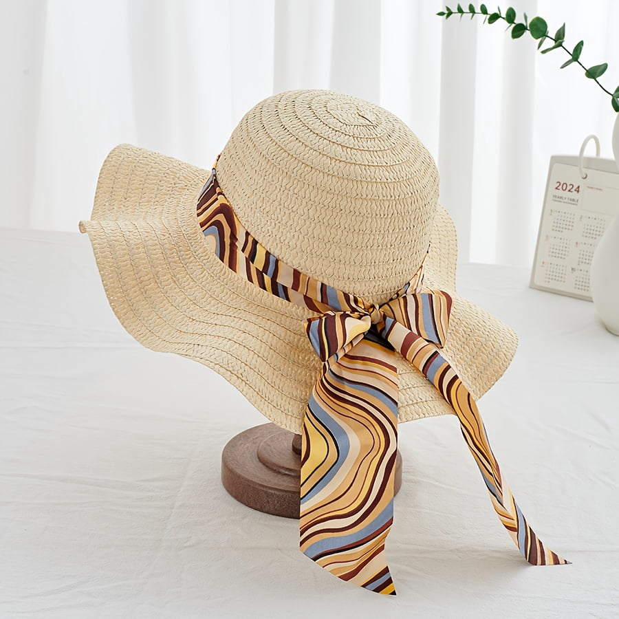 A Stylish Sun Hat with a Easy Design Featuring Striped Ribbons And a ...