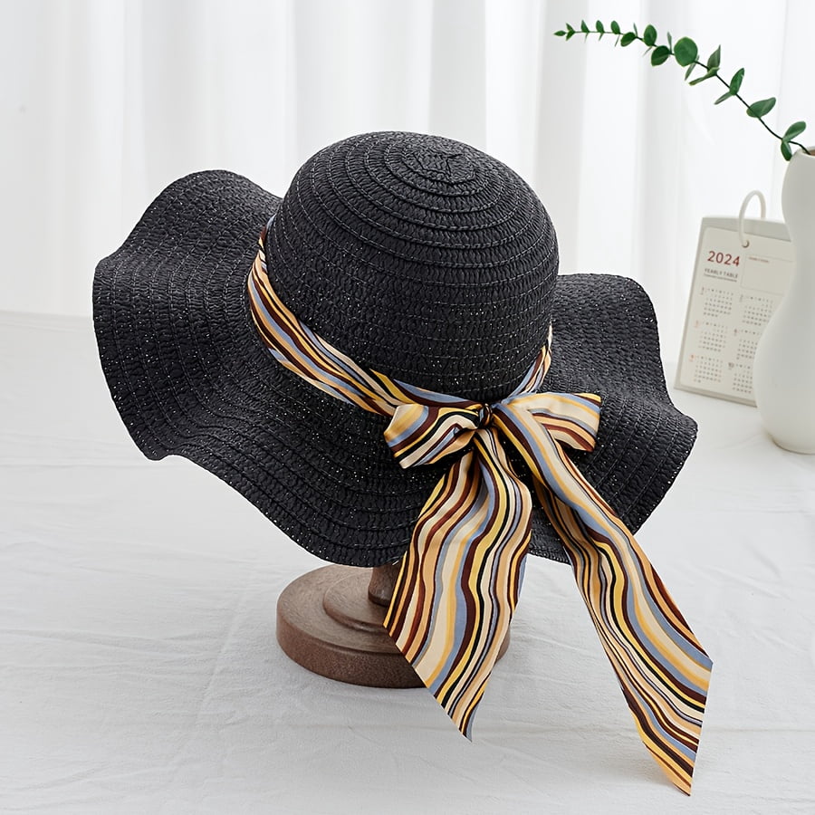 A Stylish Sun Hat with a Easy Design Featuring Striped Ribbons And a ...