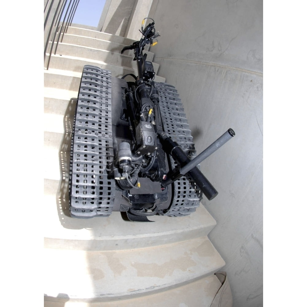 A Talon 3B robot unit climbing a flight of stairs during a training ...