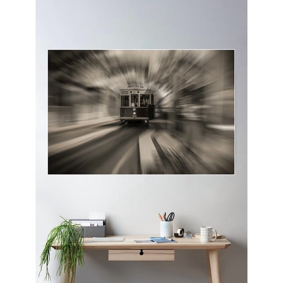 A Vintage Tram Moves Quickly Down The Track With A Blurred Background ...