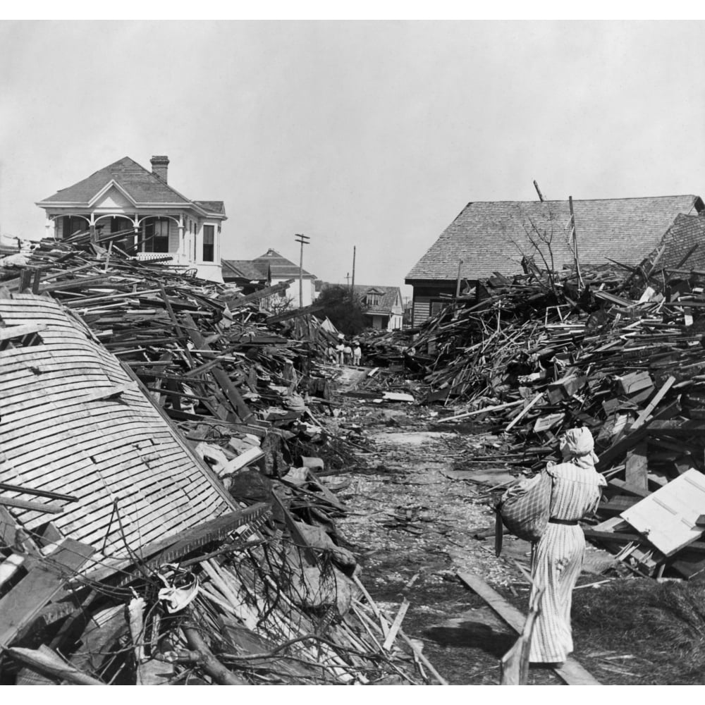 A Woman Walks Through A Passageway Opened In The Debris History (36 x ...