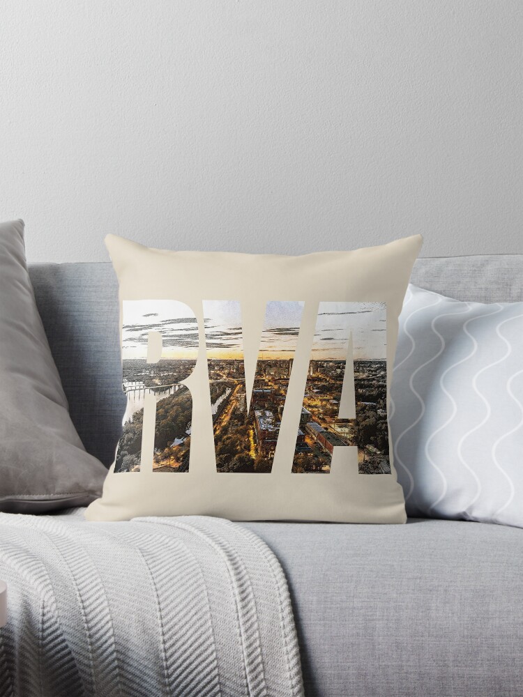 A bold RVA logo over a beautiful cityscape of Richmond and the James ...