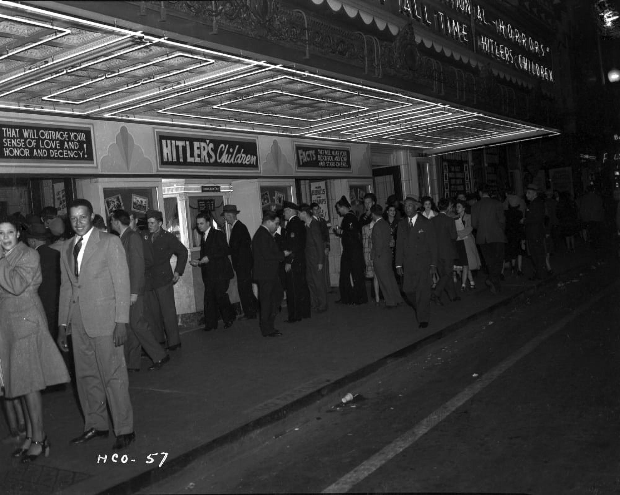 A crowd waiting outside of a movie theatre Photo Print (8 x 10 ...