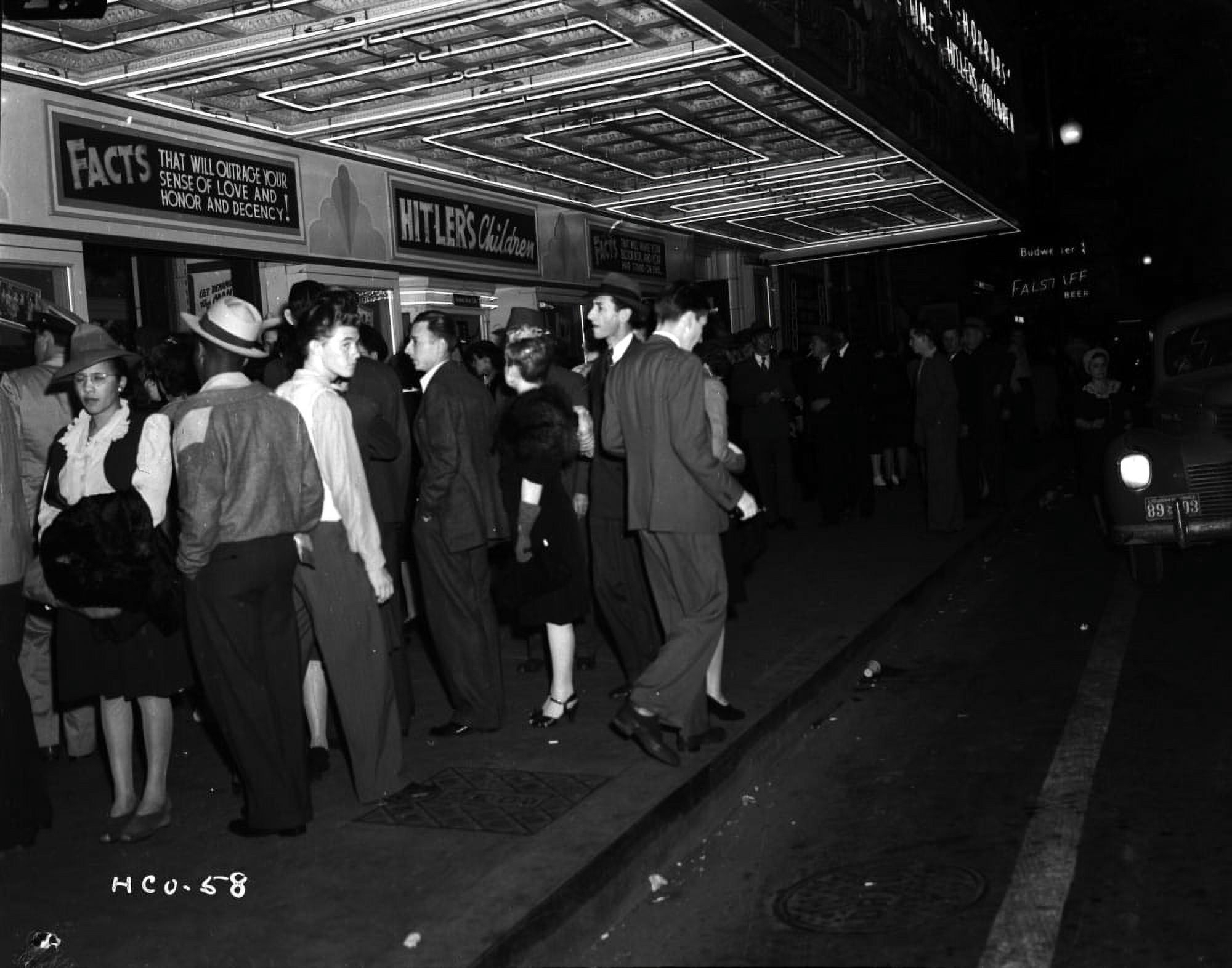 A crowd waiting outside of a movie theatre Photo Print (8 x 10 ...