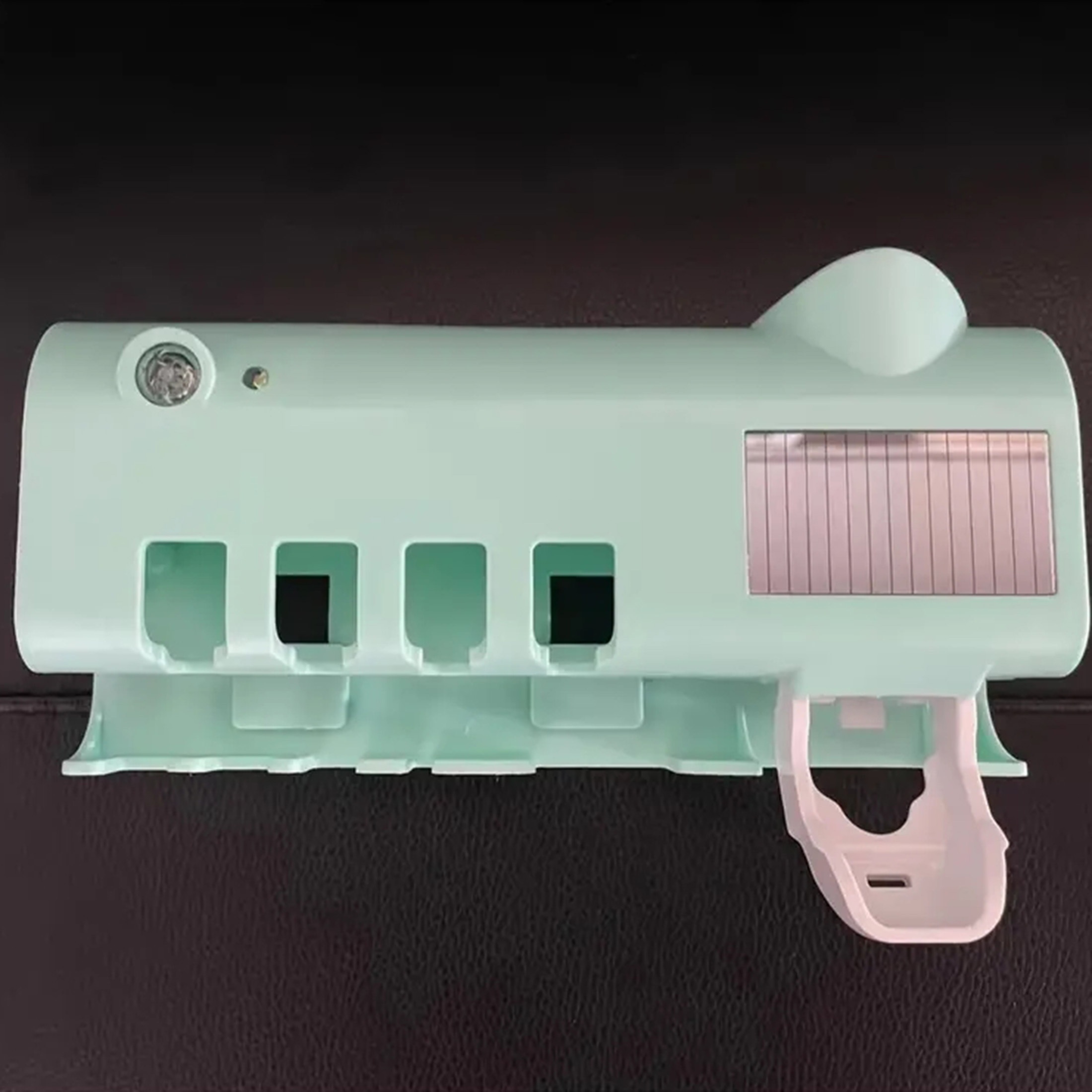 A disinfectant toothbrush holder, a wall mounted toothpaste dispenser ...