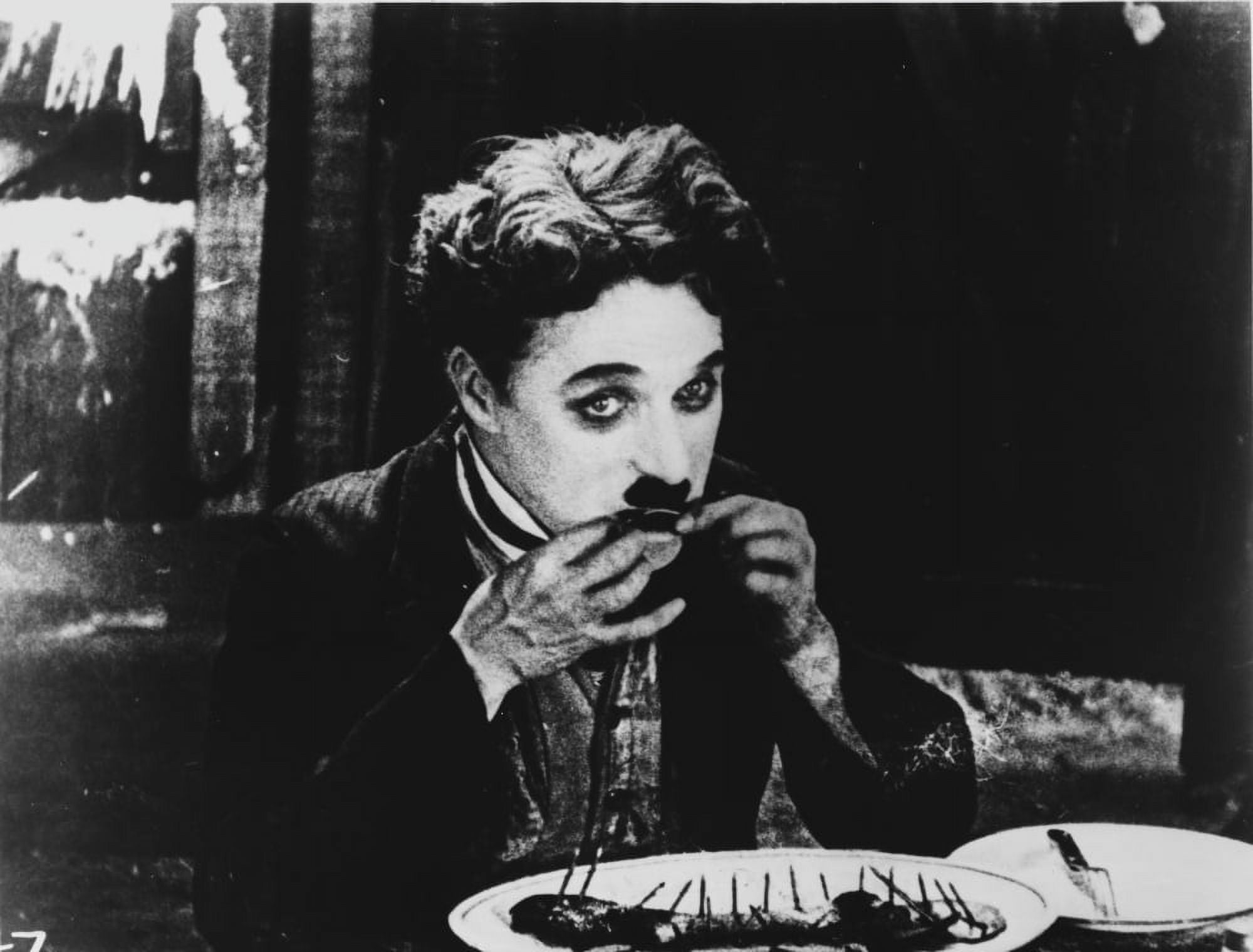 A film still of Charlie Chaplin eating Photo Print (24 x 30) - Walmart.com