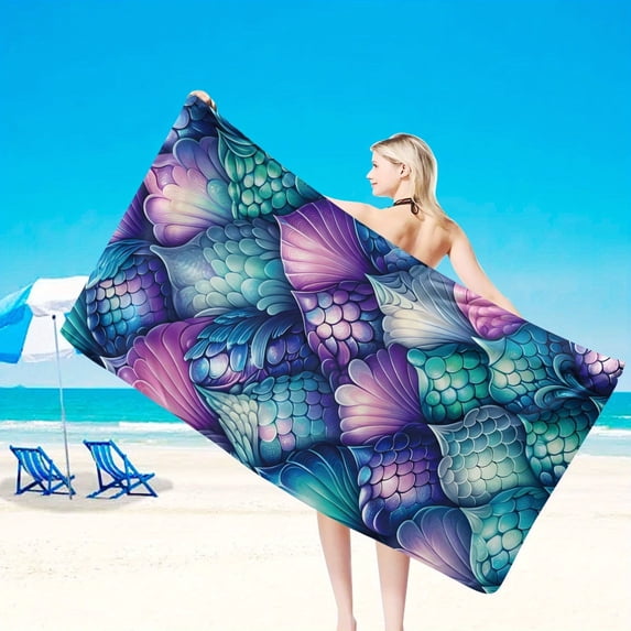 A microfiber towel with a mermaid scale design, perfect for summer ...