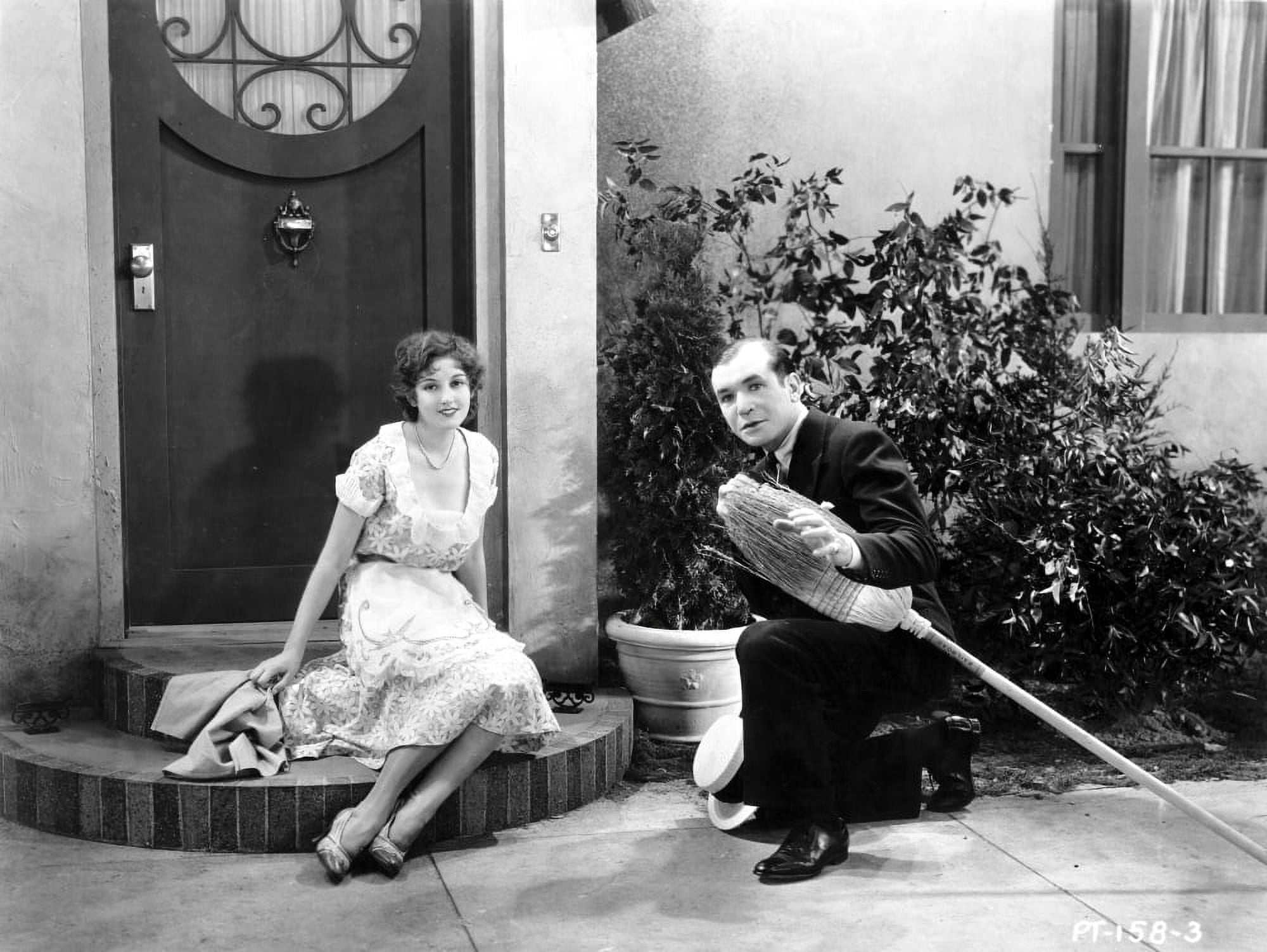 A promotional still of Harry Richman carrying a broom Photo Print (8 x ...