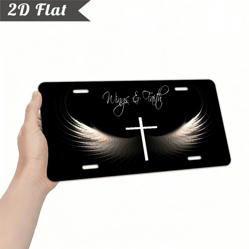 A rectangular aluminum "Wings & Faith" decorative license plate. The ...