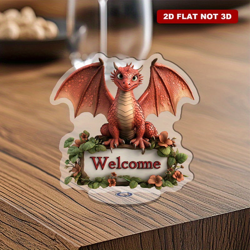 A rotating acrylic display featuring a cute red dragon on a welcome ...