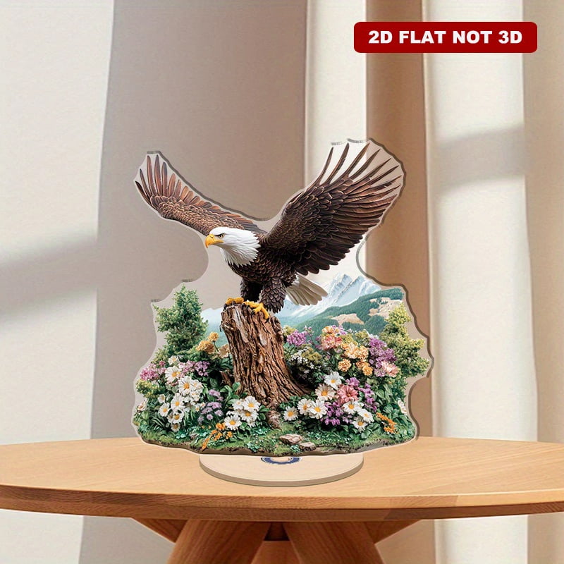 A rotating acrylic display featuring a majestic bald eagle perched on a ...