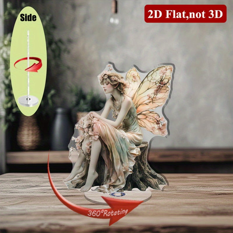 A rotating acrylic display featuring a serene fairy with delicate flowers intricate wings and a ...