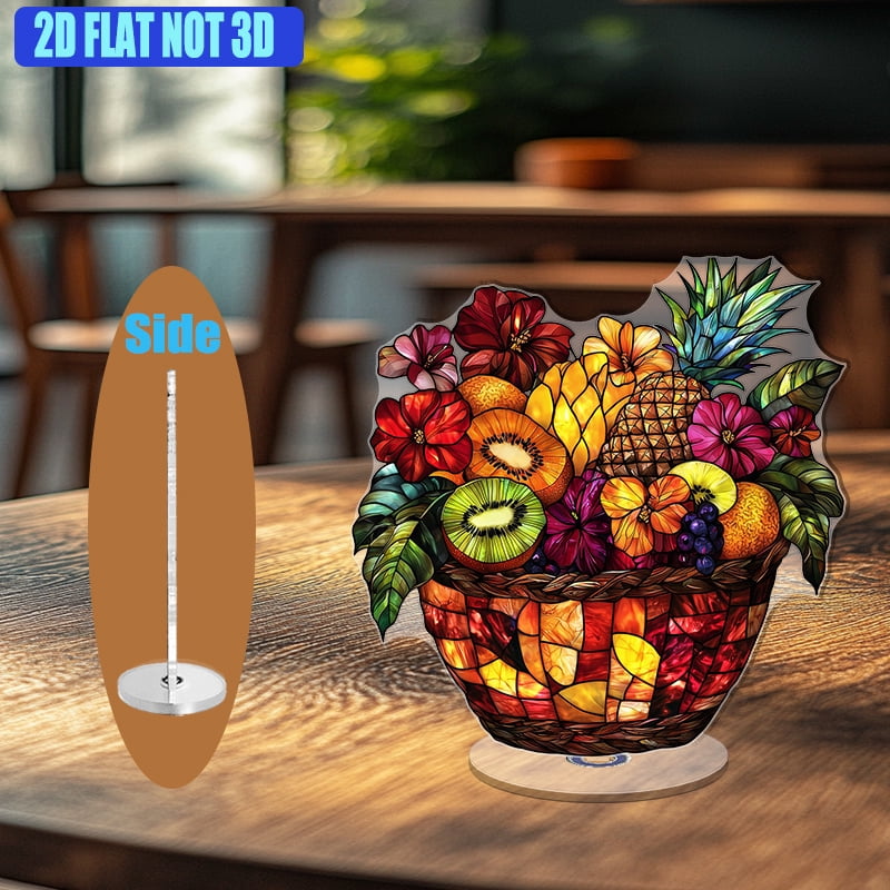 A rotating acrylic display featuring vibrant stained glass fruits and ...