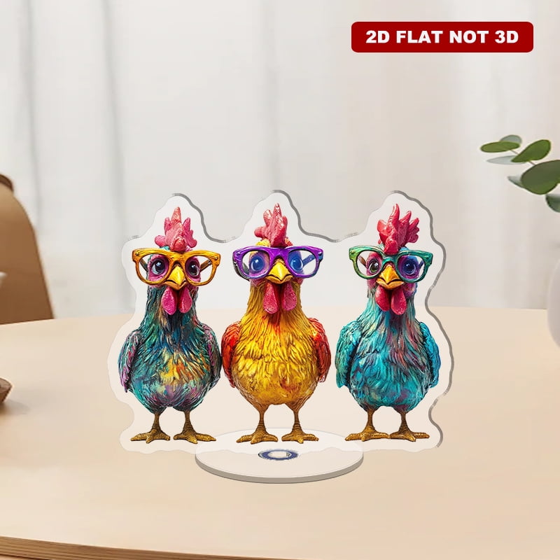 A rotating acrylic ornament featuring three cute chickens in glasses ...