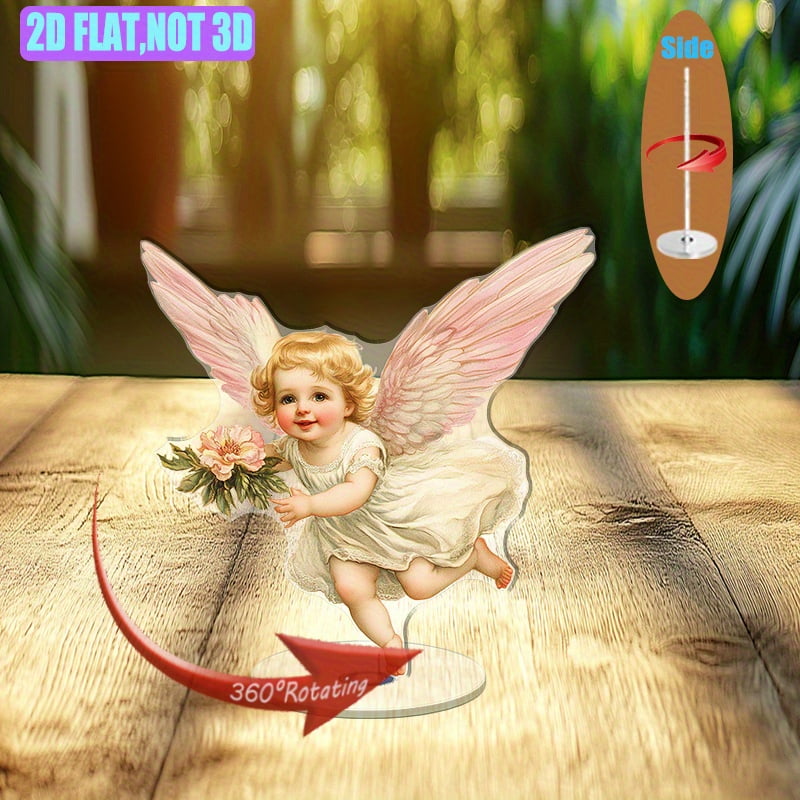 A rotating acrylic piece featuring a baby angel with blonde hair pink ...