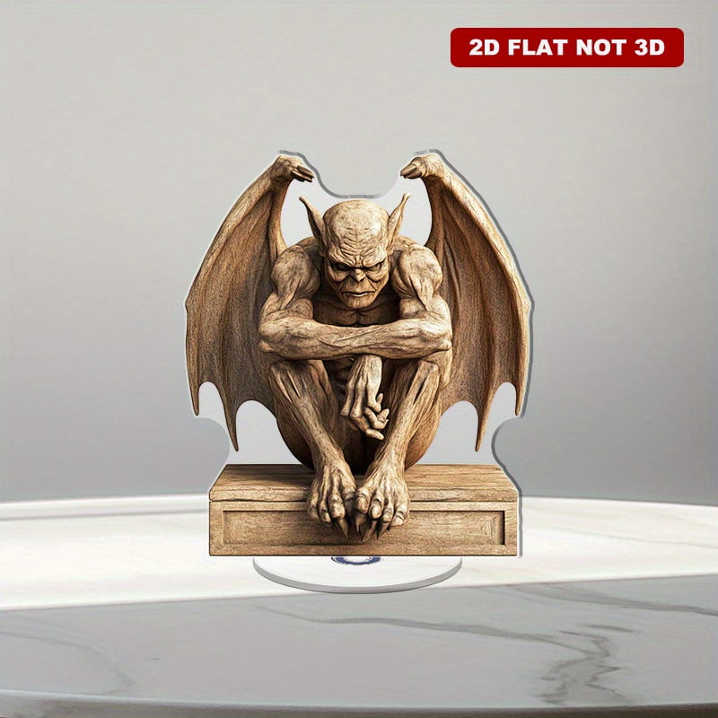 A rotating acrylic sculpture of a demon kneeling on one foot ...
