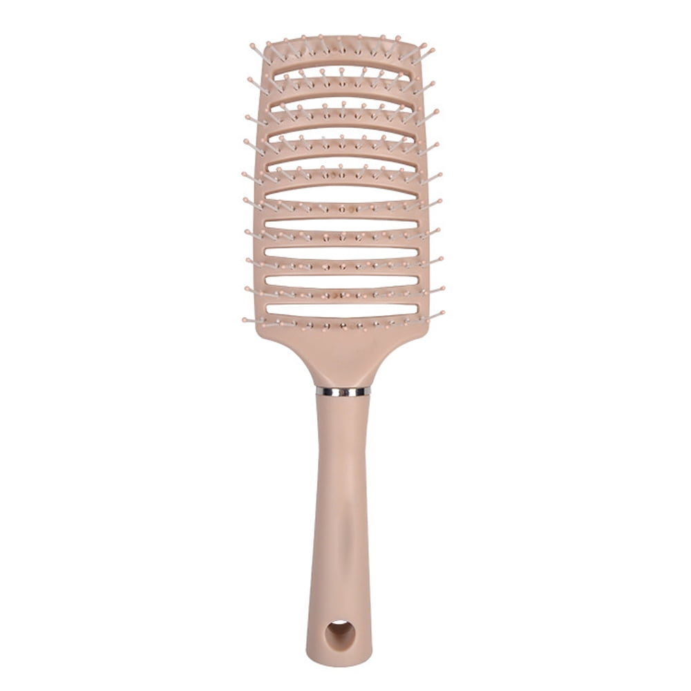 A wide curved ventilated hair comb, a brush that separates the hair and ...