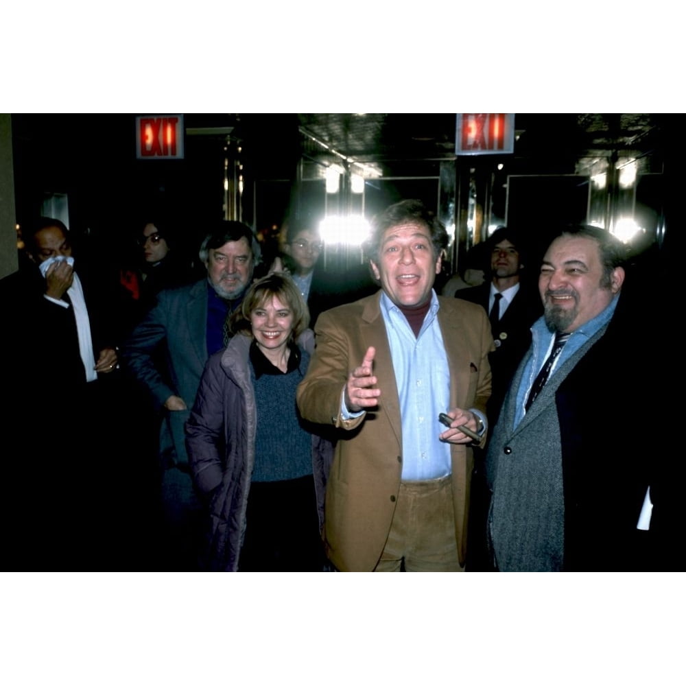 Actor George Segal with cigar in hand in lobby of event gesturing to ...