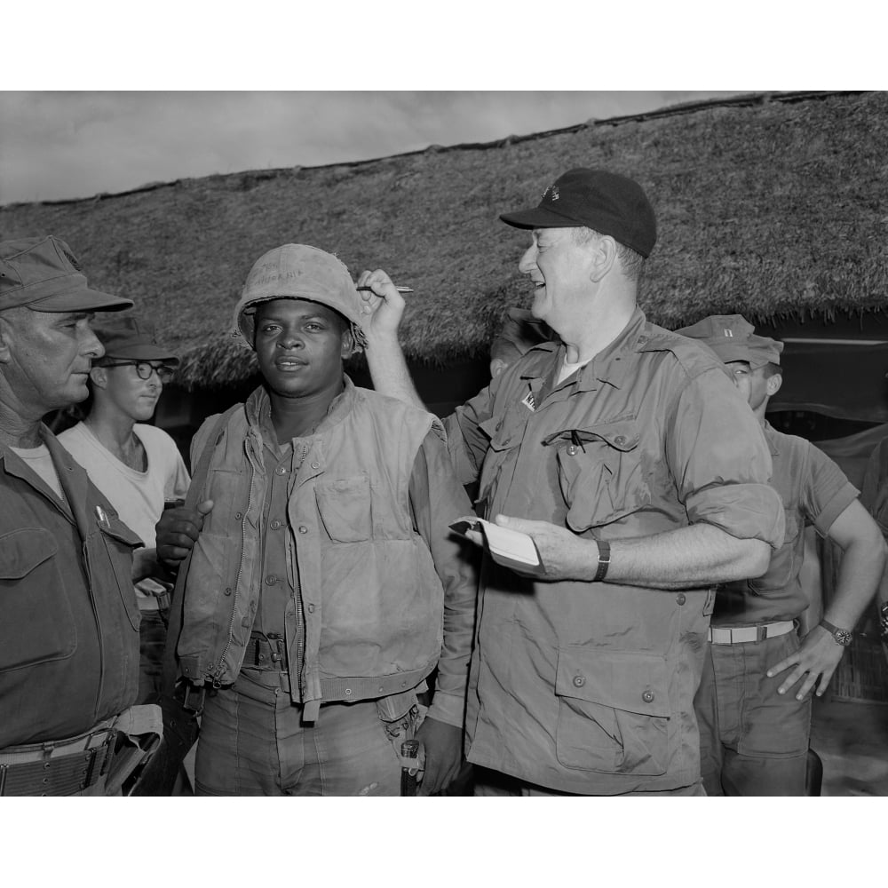 Actor John Wayne In Vietnam. John Wayne Signs Private First Class ...