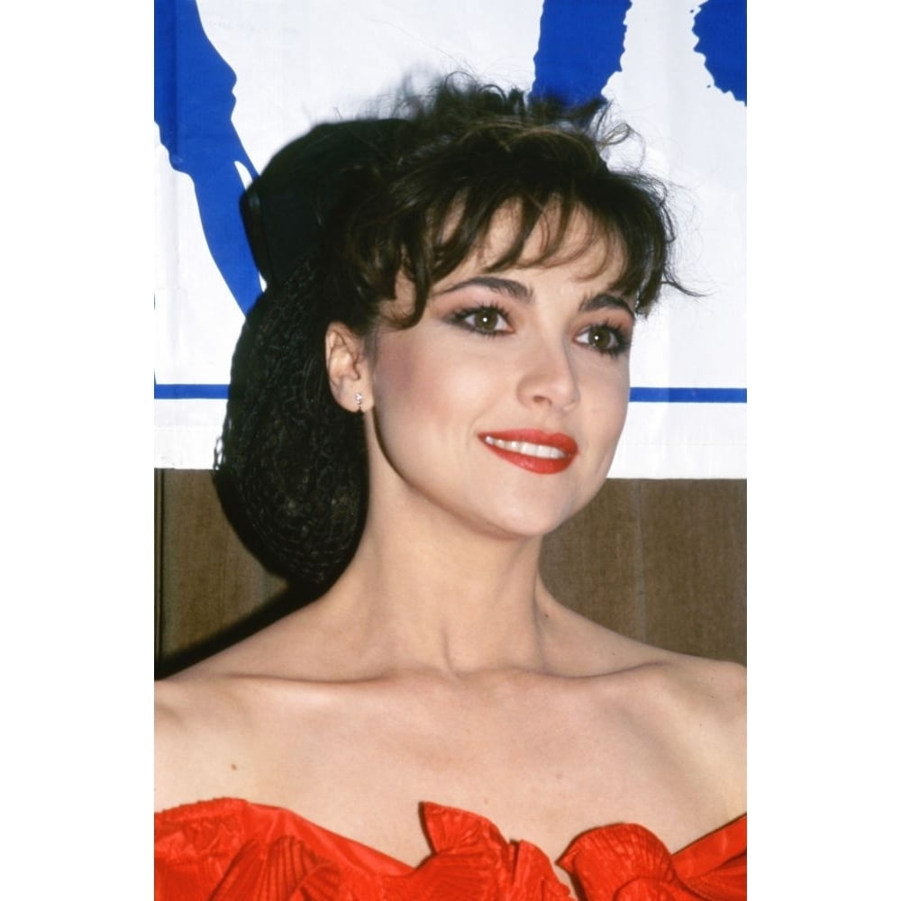 Actress Emma Samms close-up smiling wearing a red dress at Starlight ...