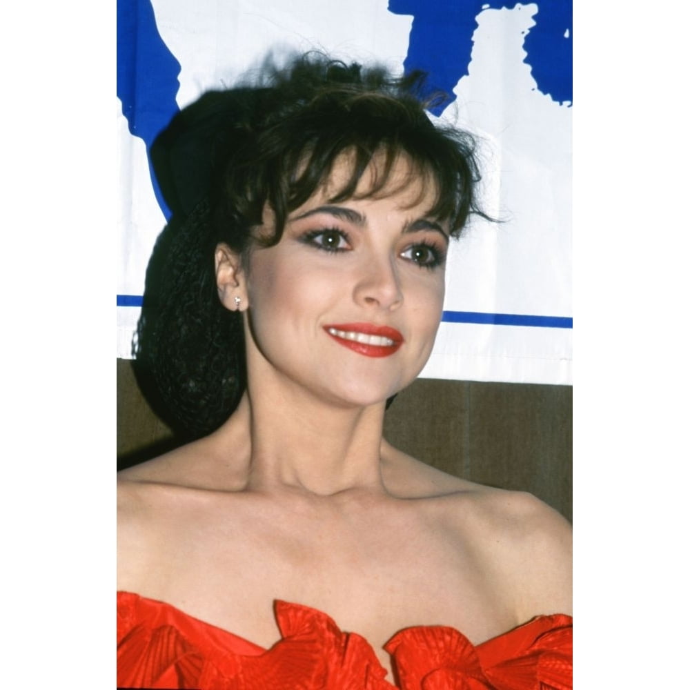 Actress Emma Samms smiling wearing a red dress at Starlight Childrens ...