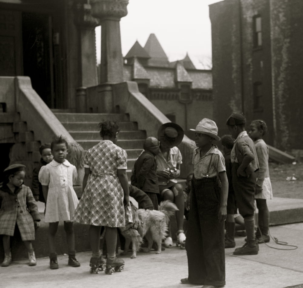 African American inner city children with Mother on stoop with dog ...