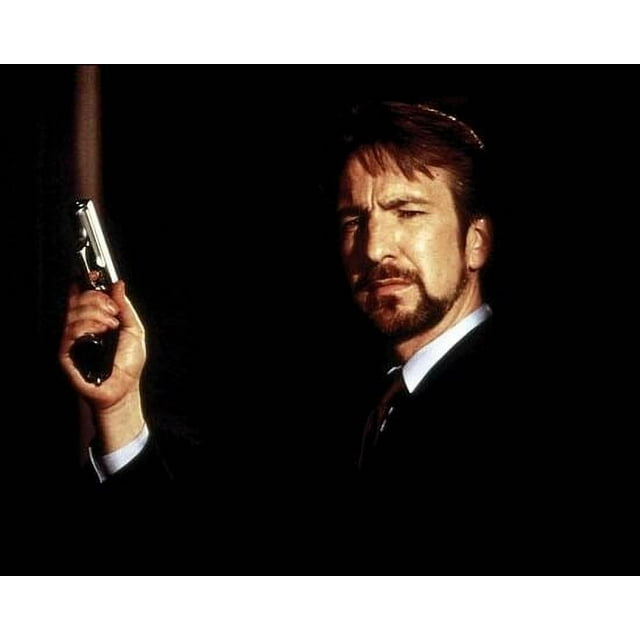 Alan Rickman as Hans Gruber holding gun looking tough in Die Hard 16x20 ...