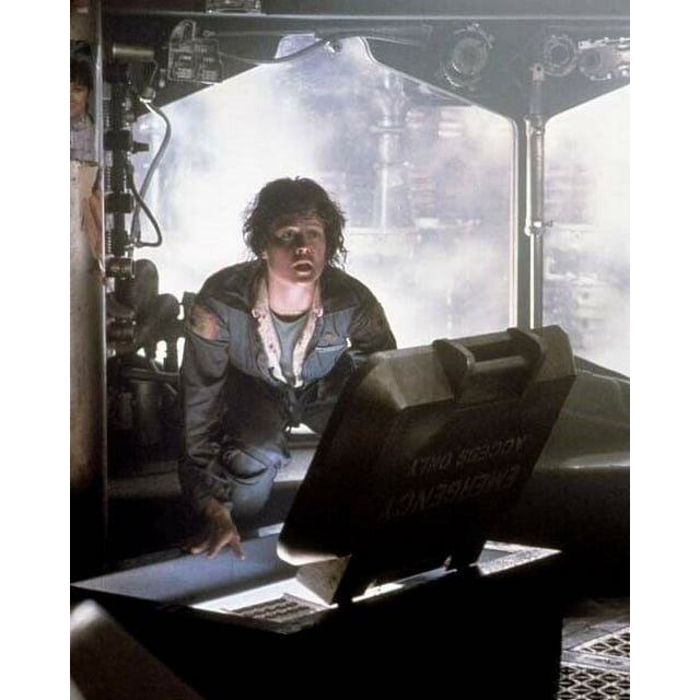 Alien 1979 Sigourney Weaver as Ripley at computer looks up in fright ...