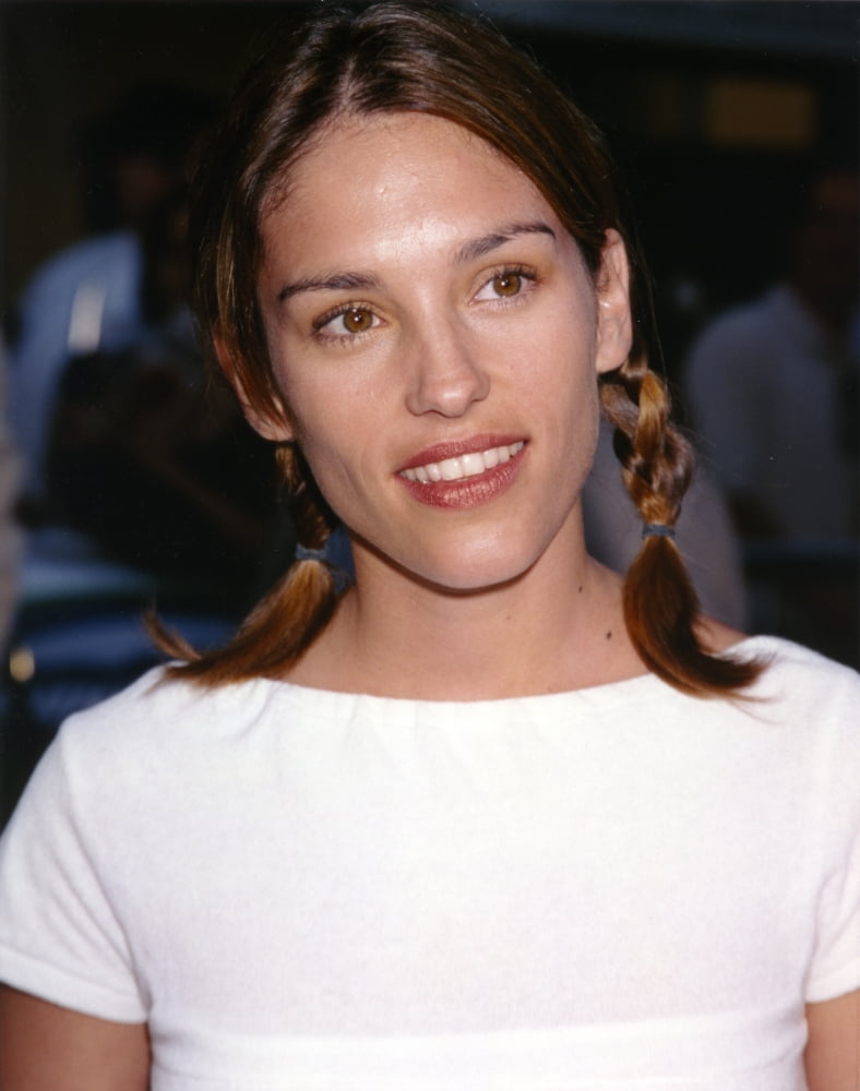 Amy Johnson Showing a Small Smile wearing White Shirt in Close Up ...