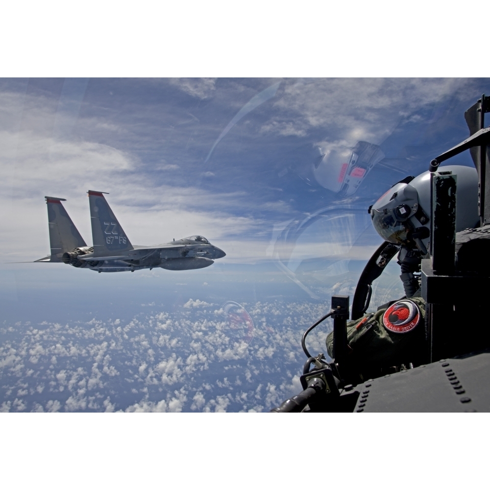 An F-15 Eagle pilot flies in formation with his wingman Poster Print ...