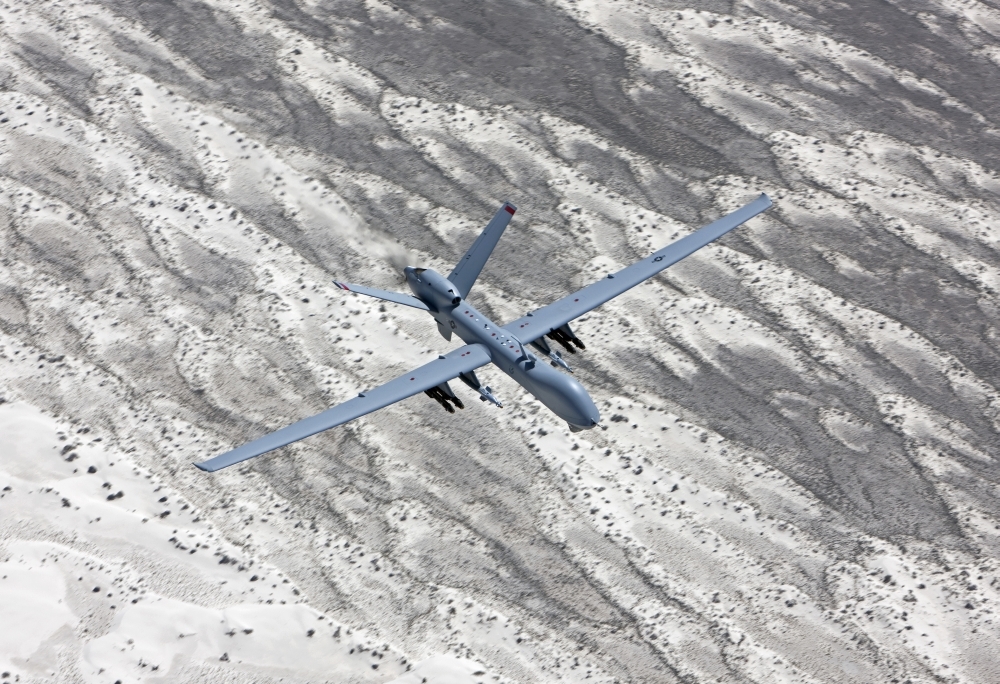 An MQ-9 Reaper flies a training mission over Southern New Mexico Poster ...