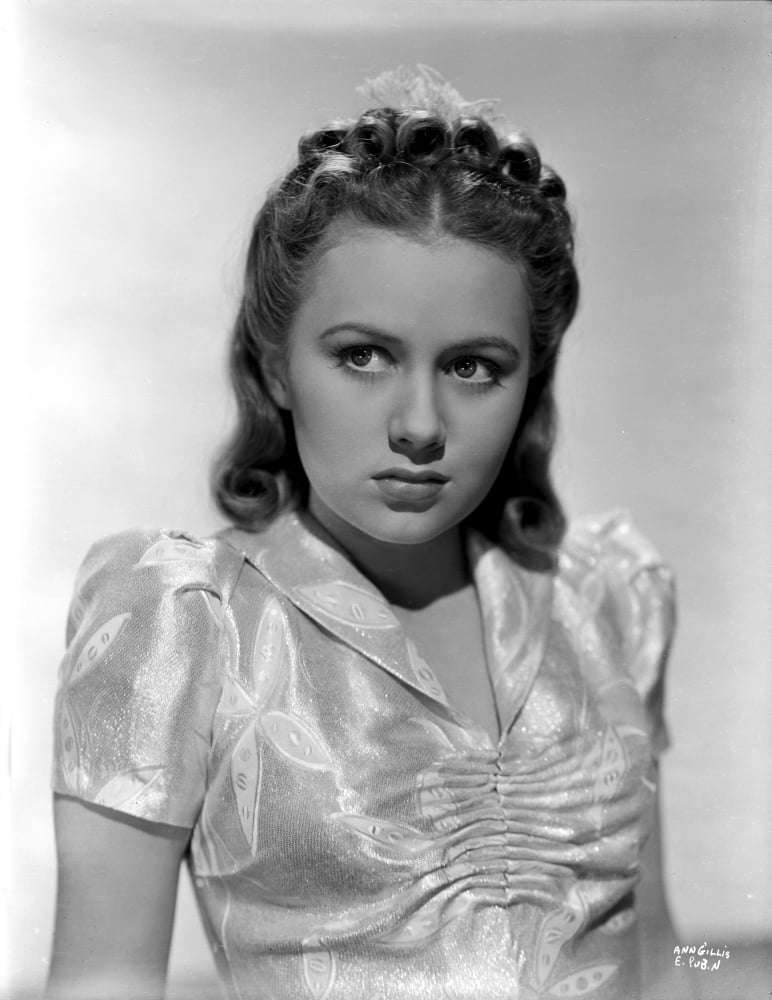 Ann Gillis Making a Lonely Face wearing a Glossy Blouse in Portrait ...