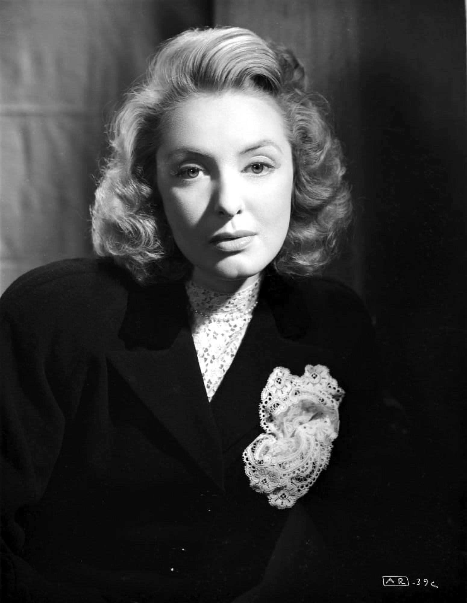 Ann Richards wearing a Black Dress with a Flower in a Classic Portrait ...