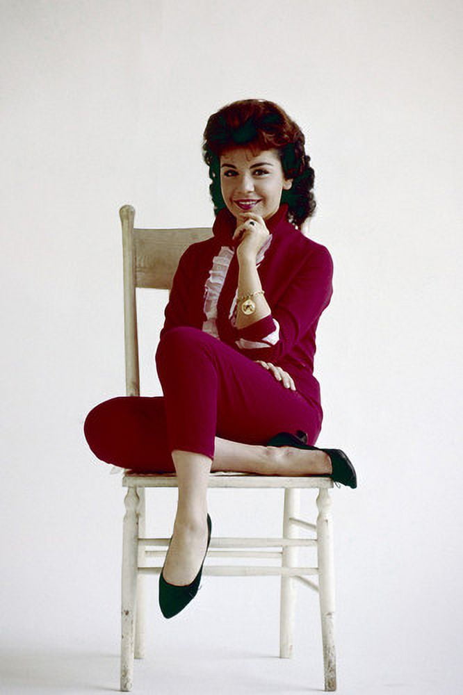 Annette Funicello sitting on white chair smiling in red outfit 24x36 ...