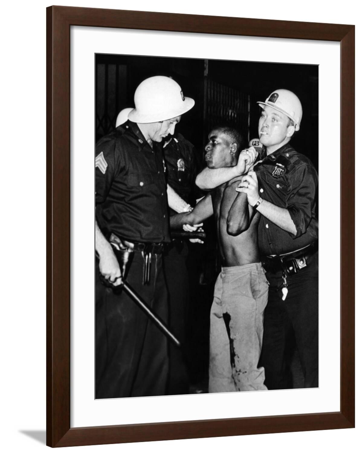 Art.com African American Who Has Been Shot in the Leg, Is Restrained by ...