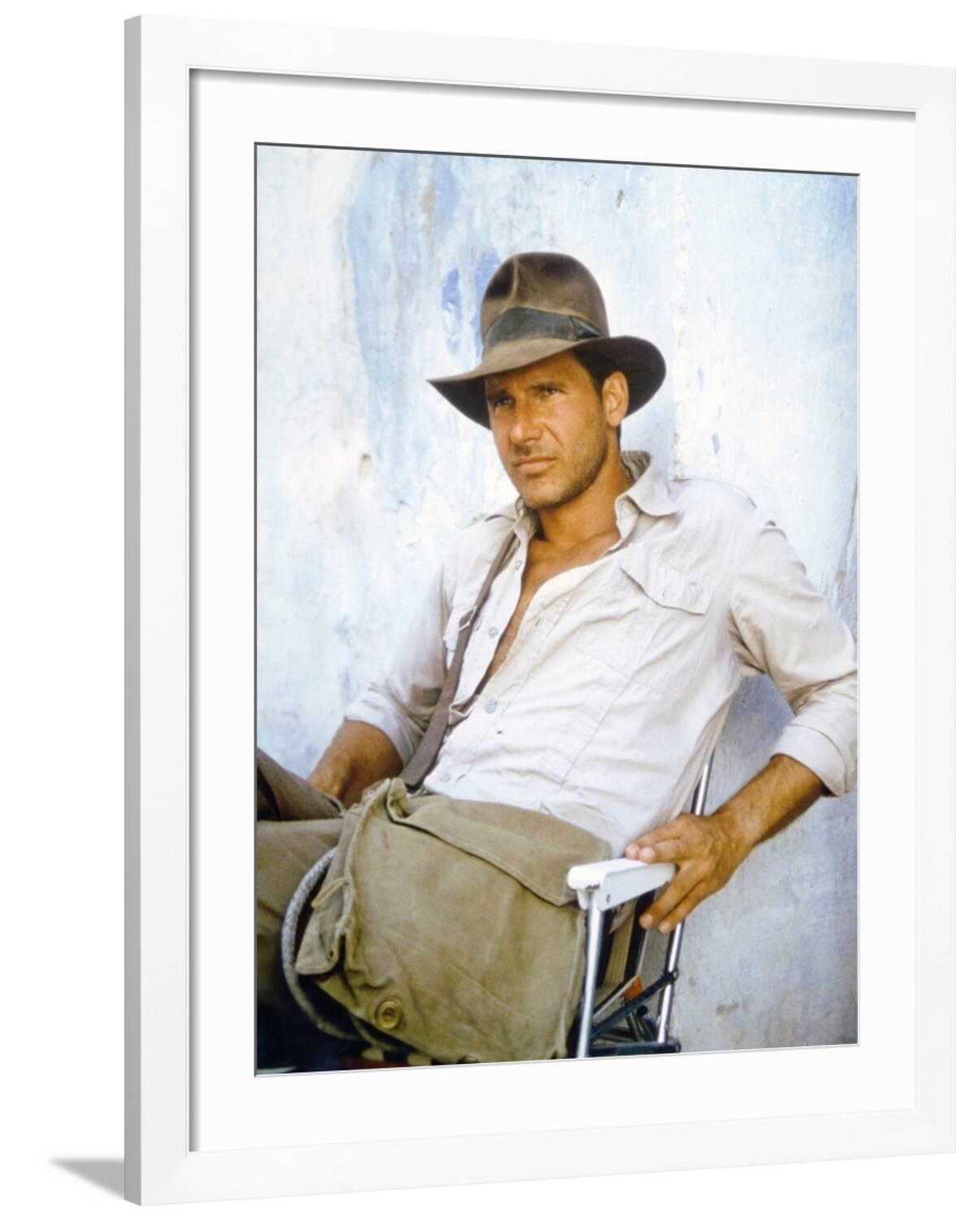 Art.com RAIDERS OF THE LOST ARK, 1981 On the set, Harrison Ford (photo ...