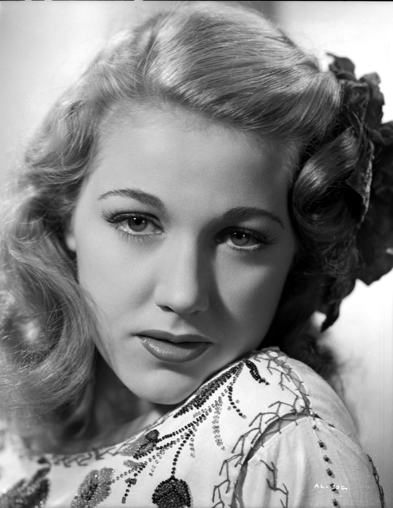 Audrey Long on an Embroidered Top with Ribbon on Head Portrait Photo ...