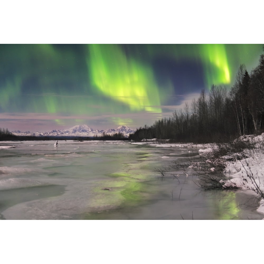Aurora borealis over frozen Susitna River with Mt. Foraker and Mt ...