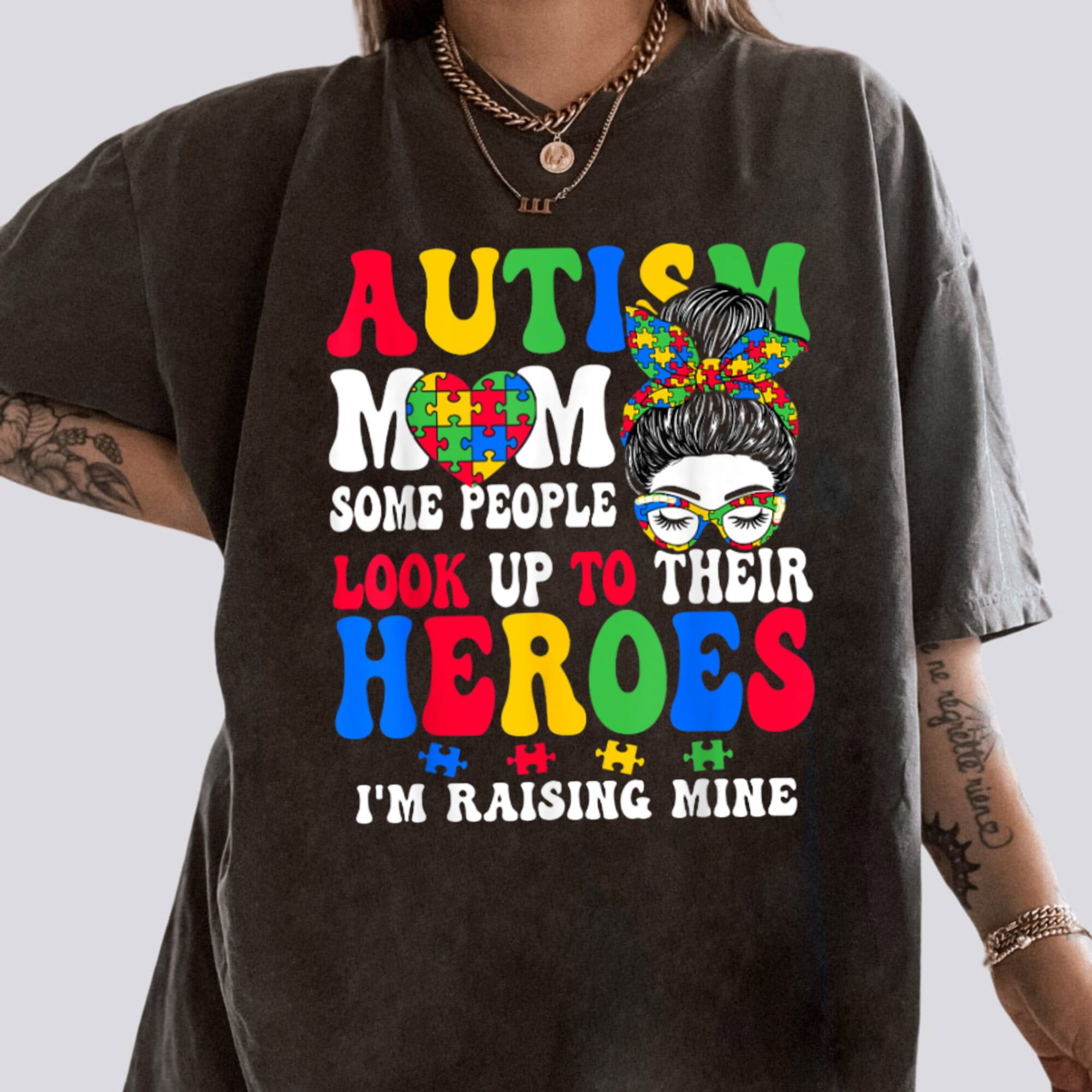 Autism Mom Raising Hero Groovy Messy Bun Autism Awareness T-Shirt ...