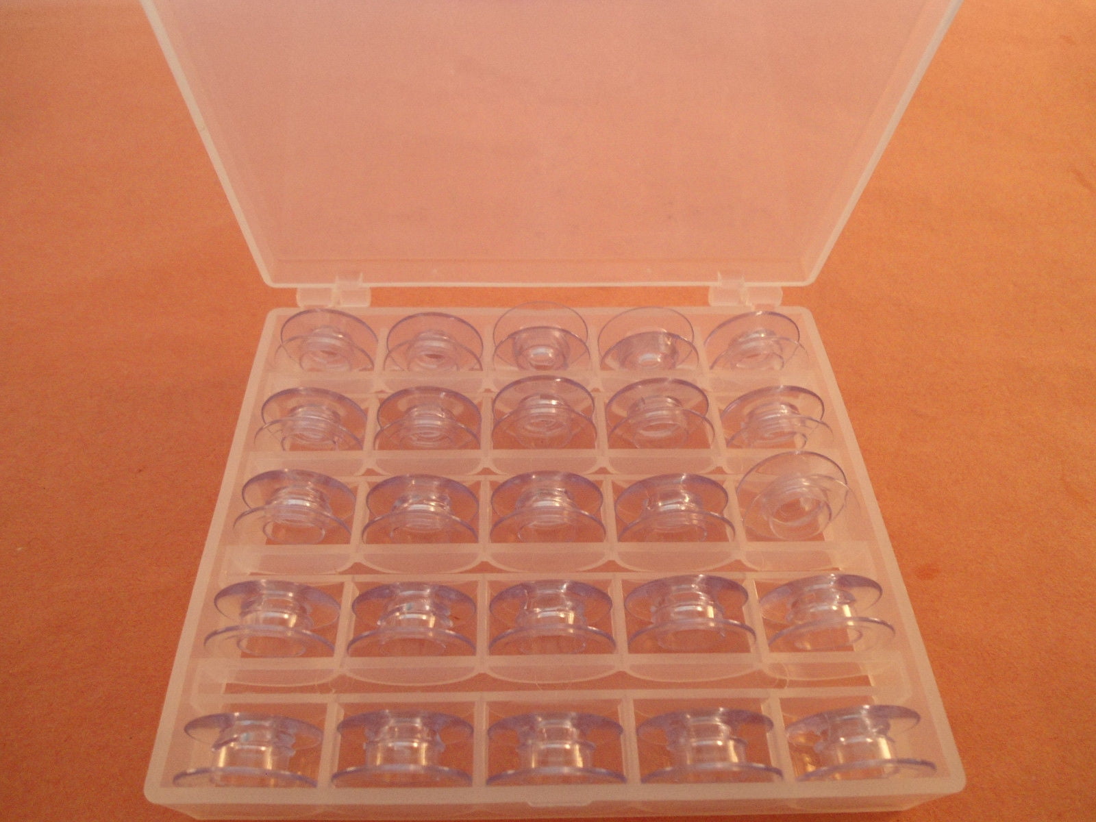BOX OF 25 CLEAR CONCAVE BOBBINS VIKING 1,1+, HUSQVARNA VIKING 1100 ...