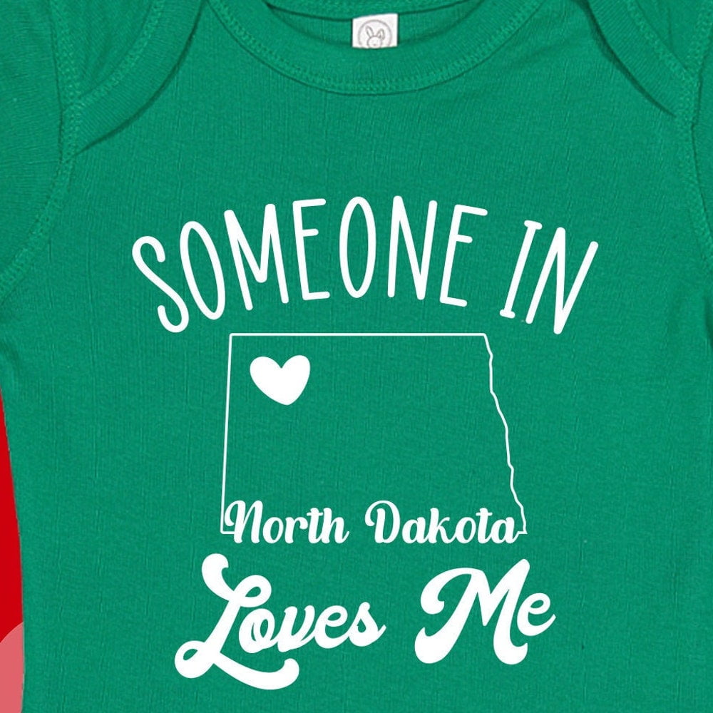 Baby Bodysuit BELLA CANVAS North Dakota Baby Bodysuit, Someone Loves Me ...