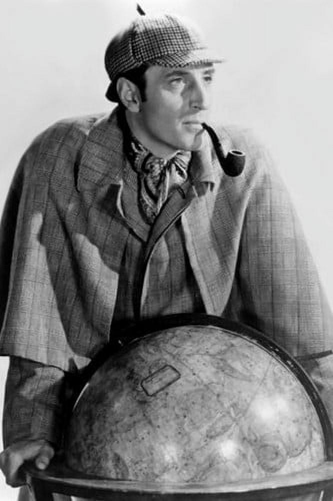 Basil Rathbone in Sherlock Holmes Faces Death posing by world globe in ...
