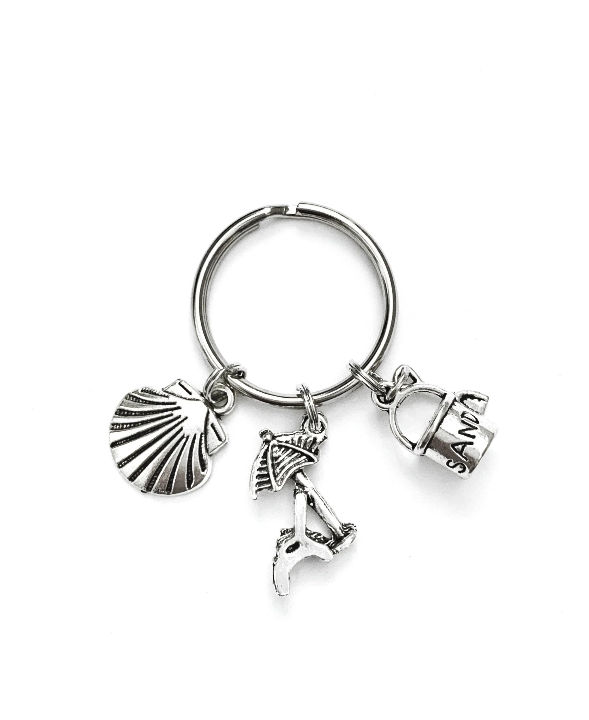 Beach themed keychain. Includes Seashell, Beach Chair with Sun Umbrella ...