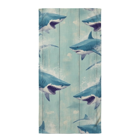 Beach towel shark A group of sharks swimming in the ocean on a wooden ...