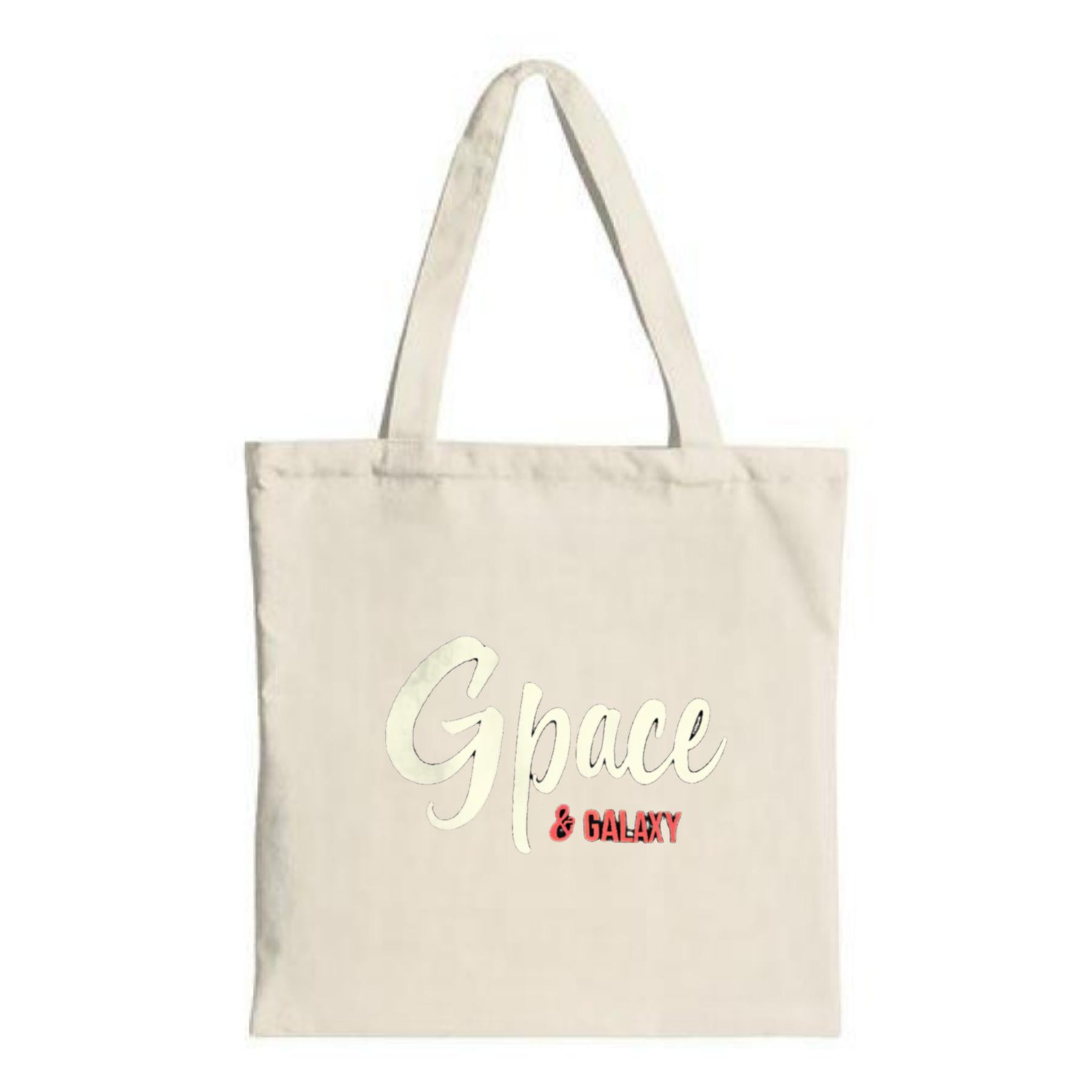 Beige Canvas Tote Bag with " Space " in cursive and bold " & MALICE ...