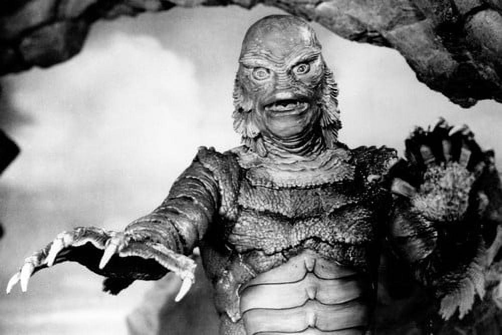 Ben Chapman in Creature from the Black Lagoon arms outstretched as ...